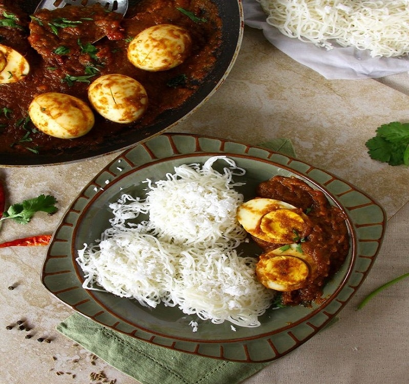 Idiappam with egg curry - FoodiaQ